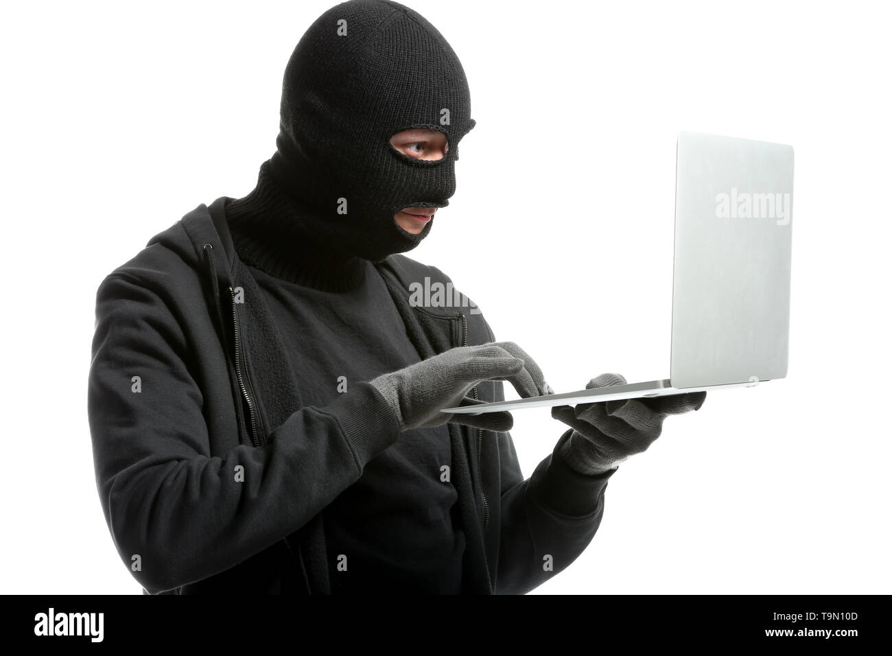Male thief laptop on hi-res stock photography and images - Alamy