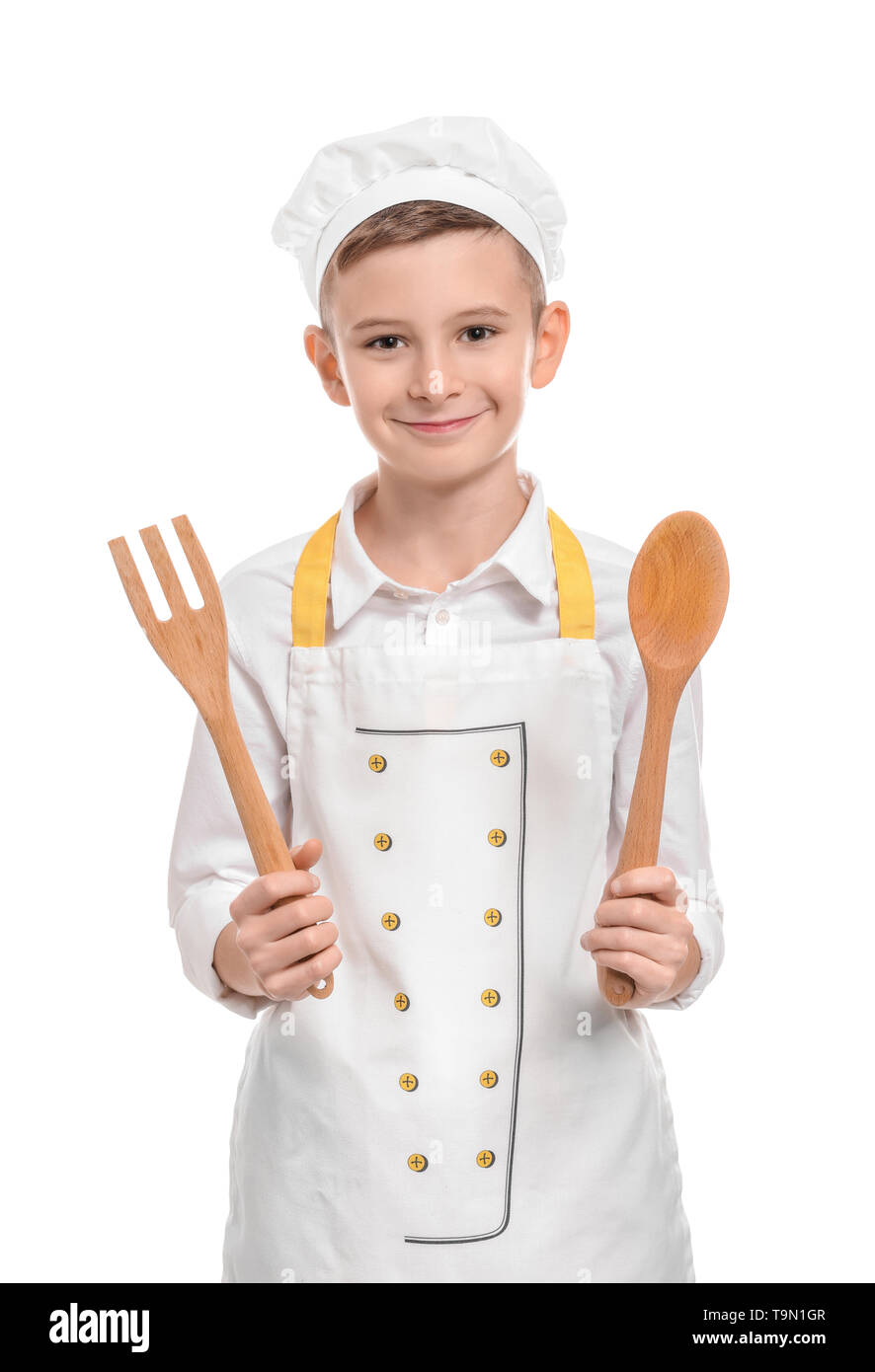Cute little chef with kitchen utensils on white background Stock Photo ...