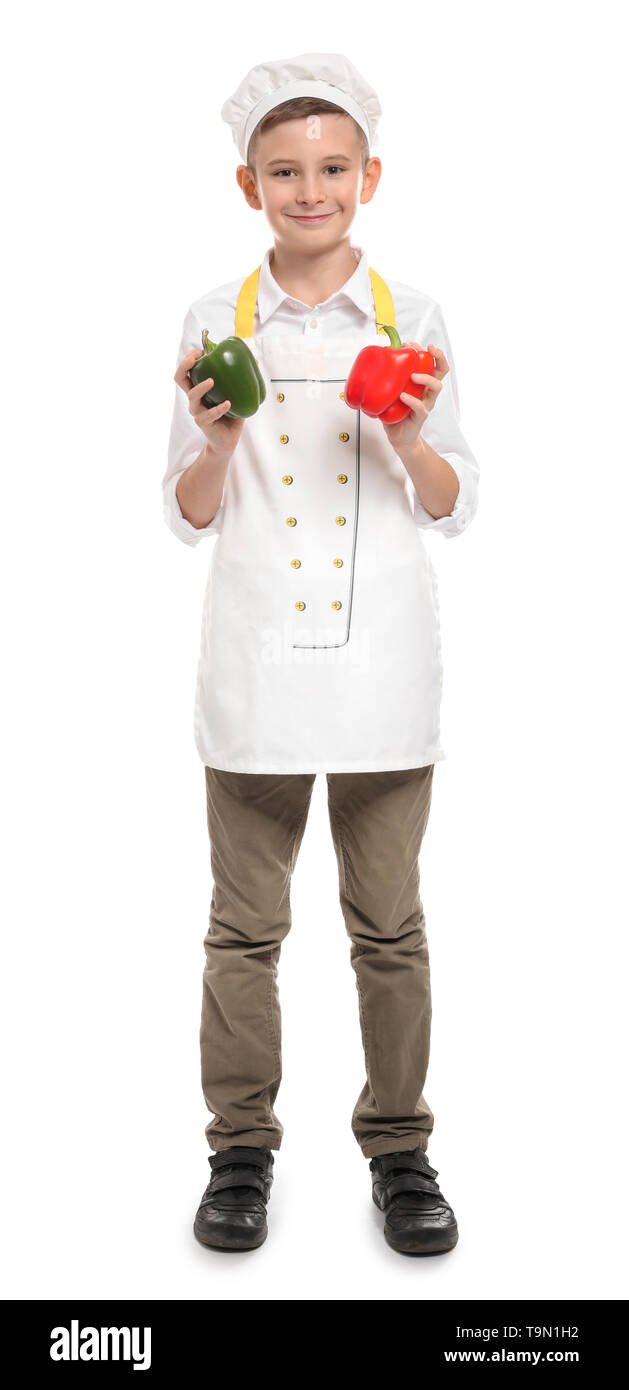 Cute little chef with peppers on white background Stock Photo - Alamy