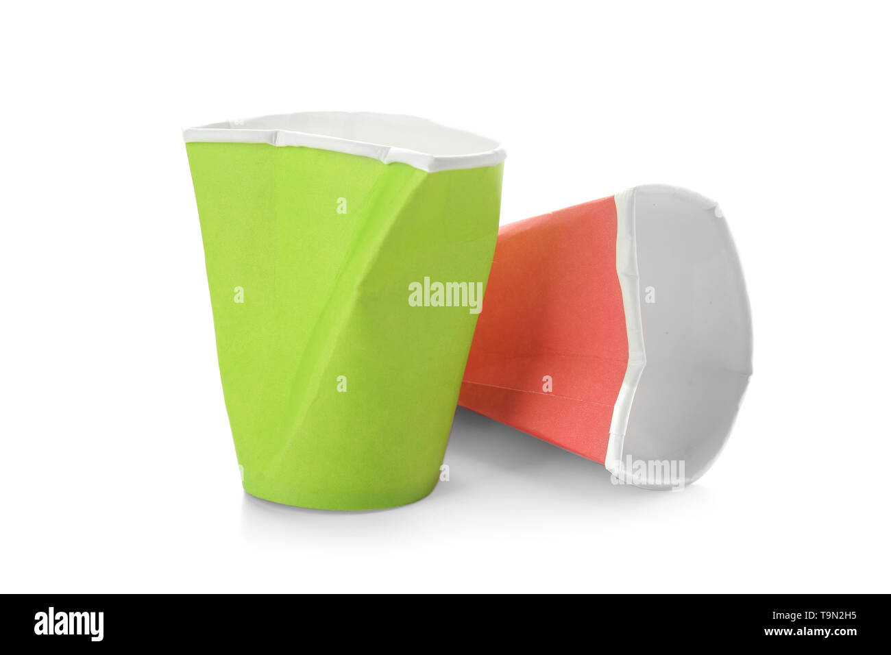 Used paper cups on white background. Recycling concept Stock Photo - Alamy