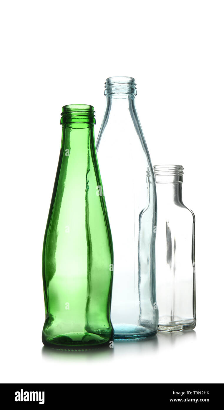 Used glass bottles on white background. Recycling concept Stock Photo ...
