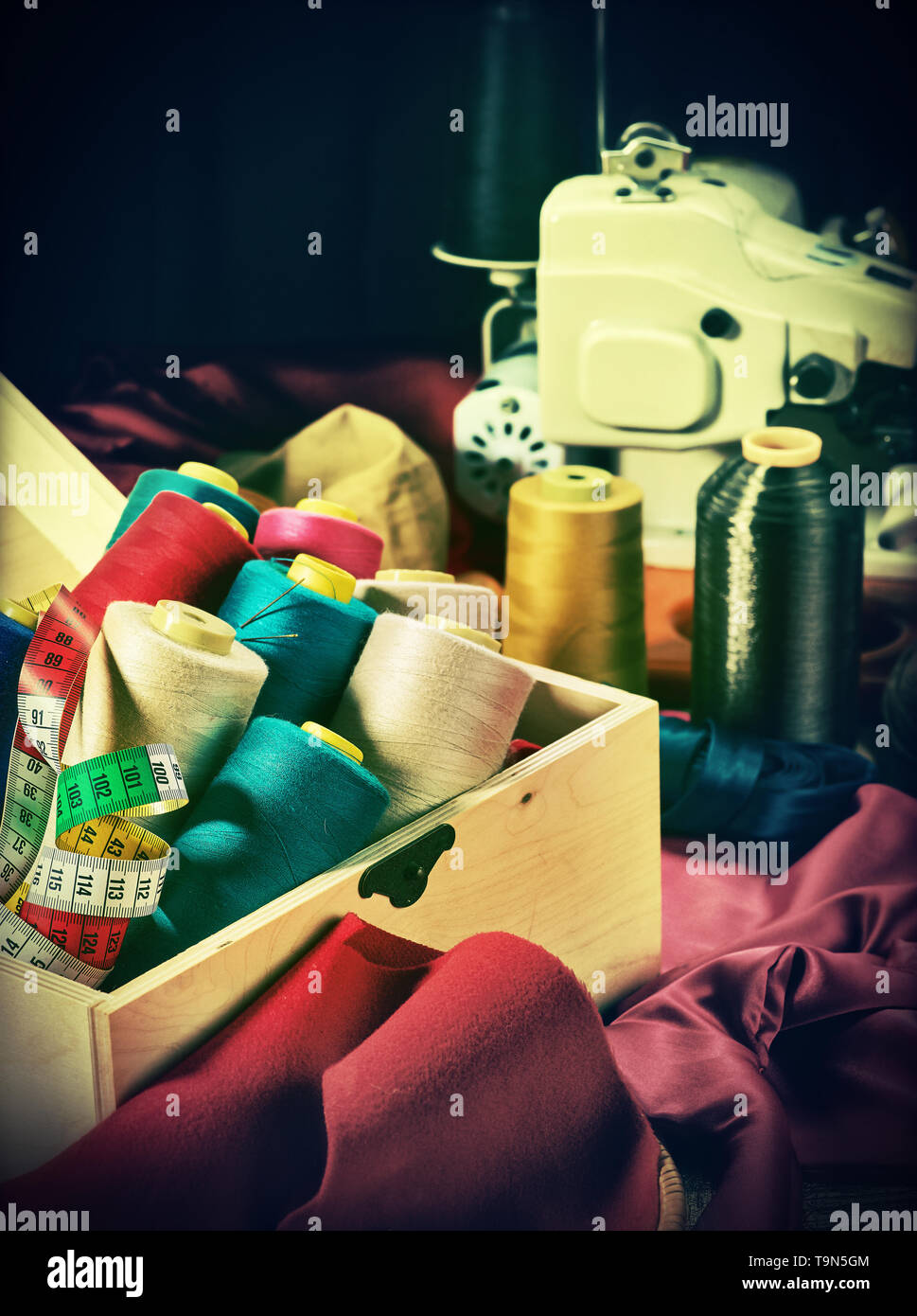 Sew seamstress group object sewing spool and serger Stock Photo - Alamy