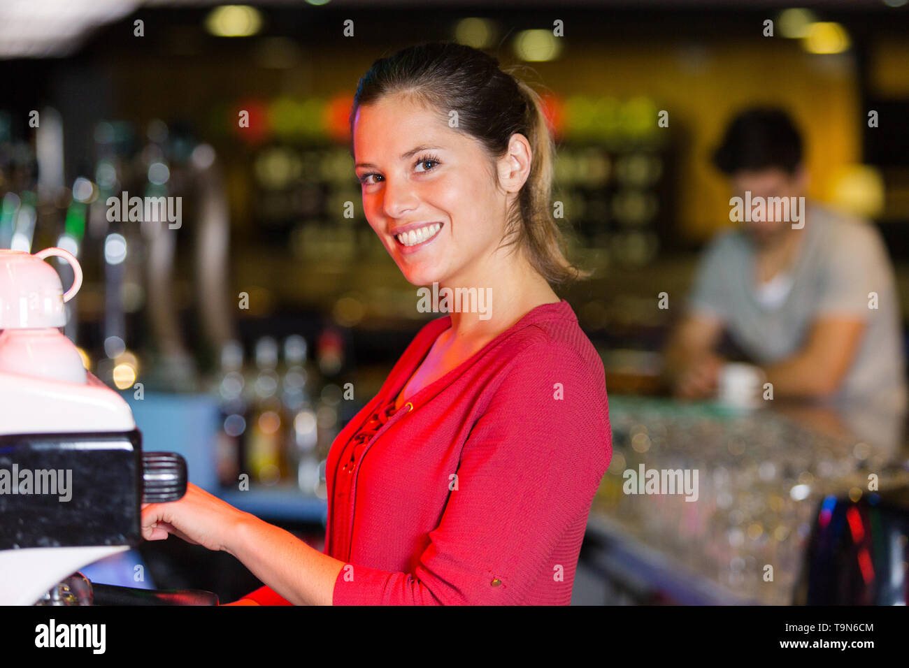 pretty barmaid in the bar Stock Photo - Alamy