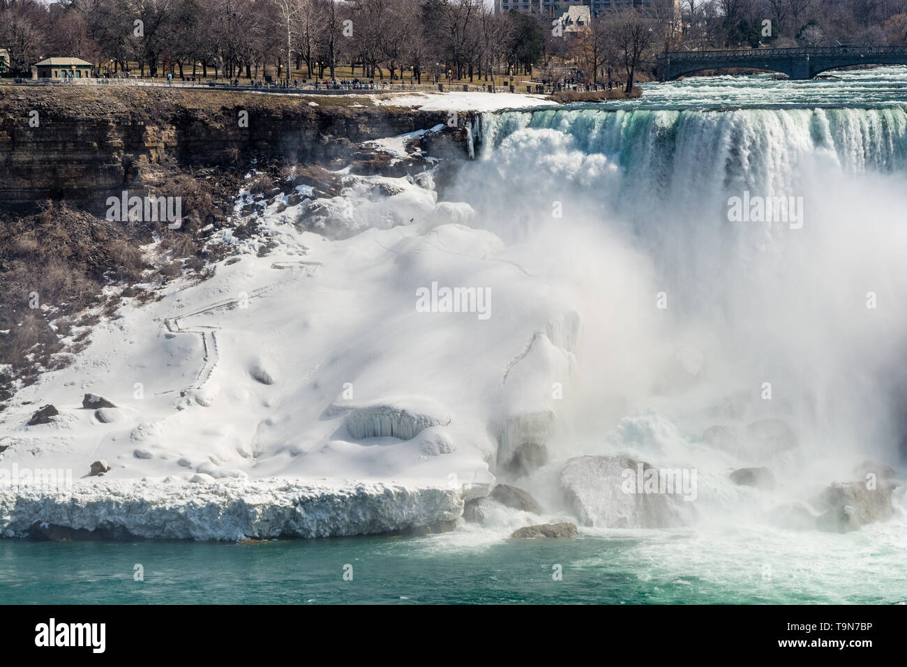 Winter scene of Niagara Falls in Canada showing frozen snow covered ...
