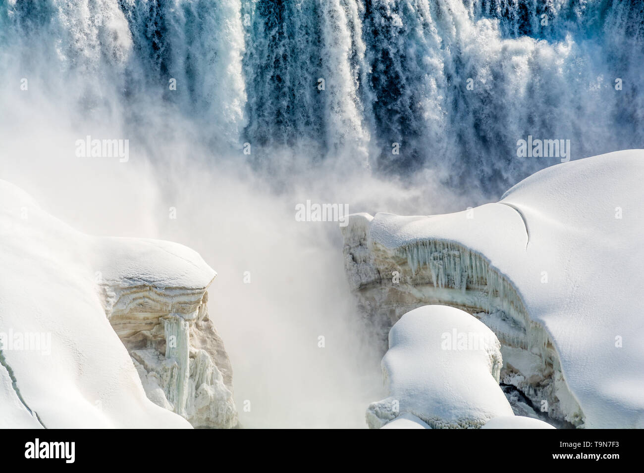 Winter scene of Niagara Falls in Canada showing frozen snow covered ...