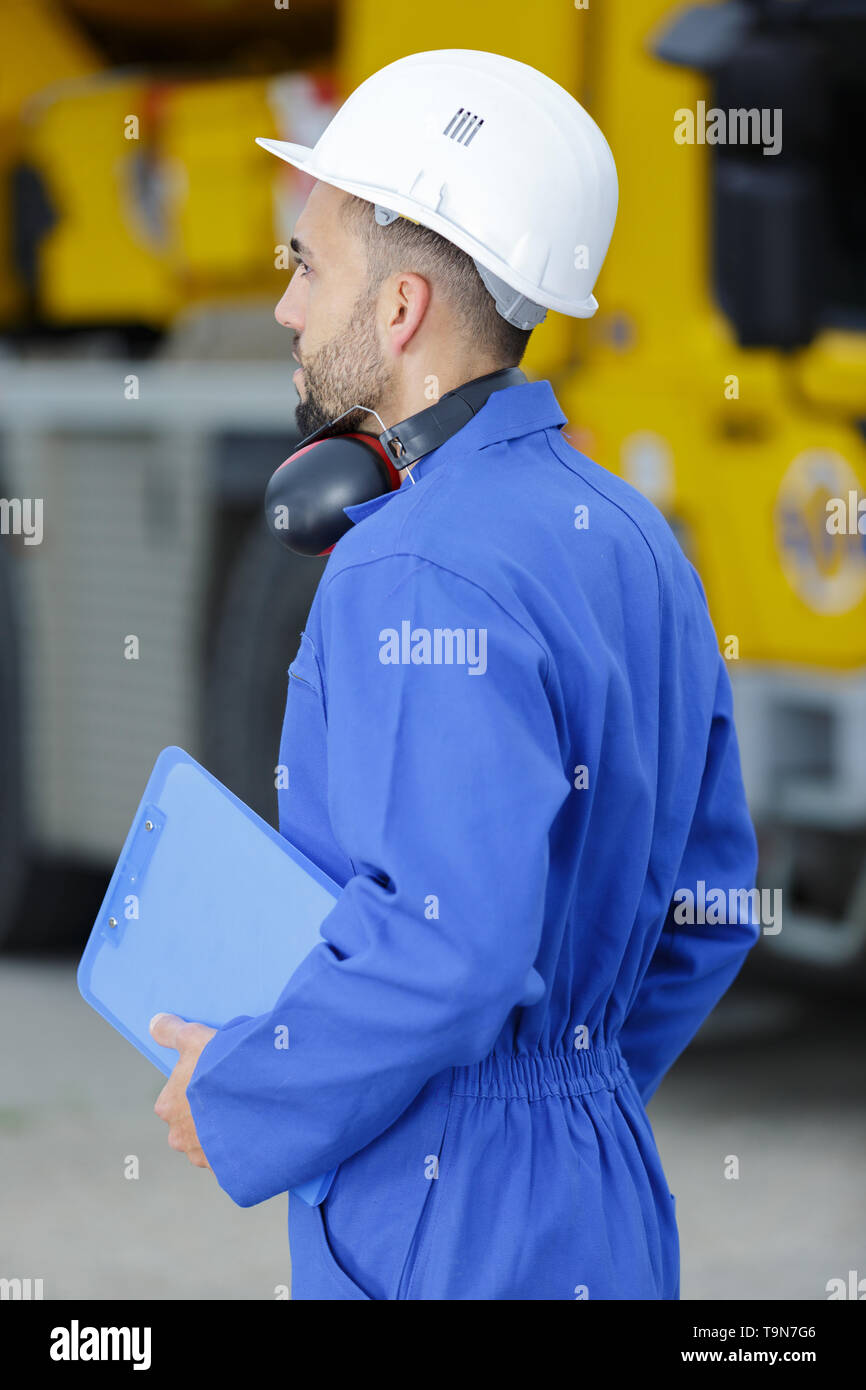 man in a helmet thinks how to proceed Stock Photo - Alamy