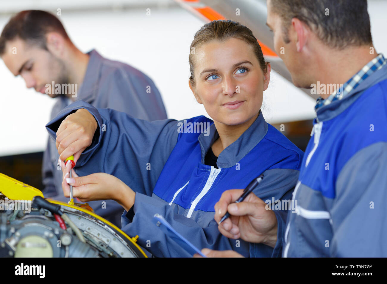Team professional auto mechanics hi-res stock photography and images ...