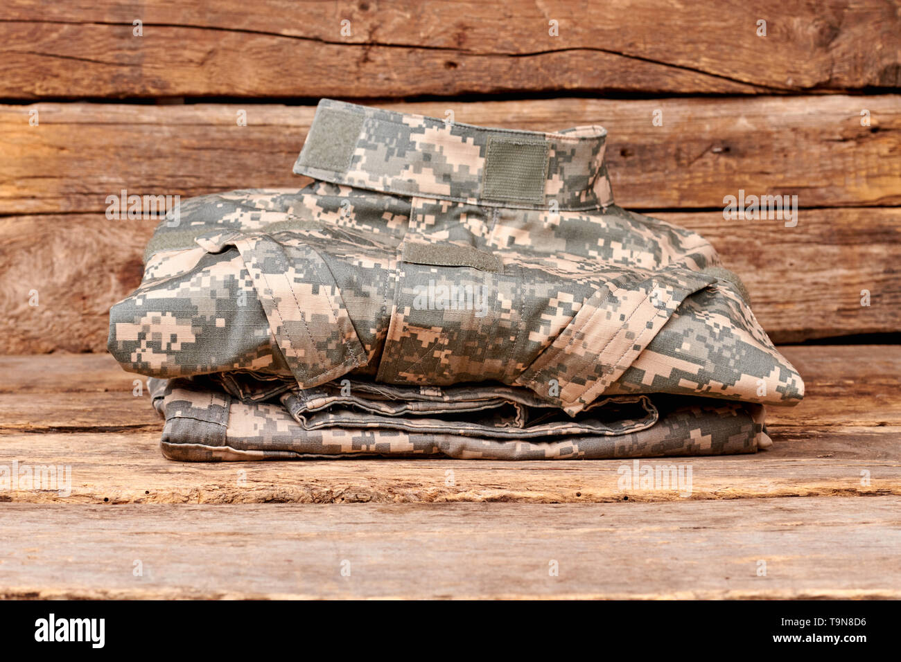 Folded military soldier outfit Stock Photo - Alamy