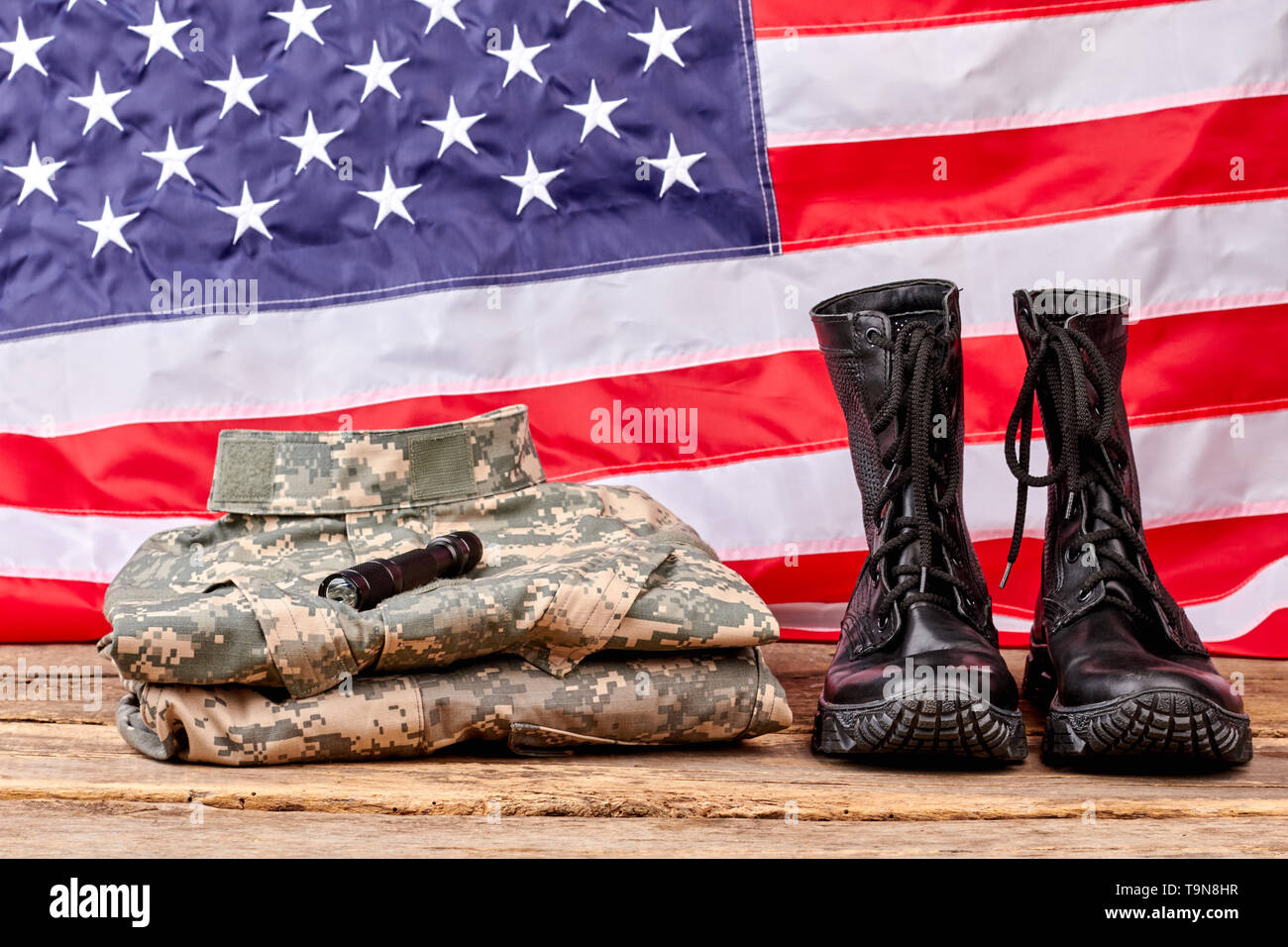 Army military outfit with us flag background Stock Photo - Alamy