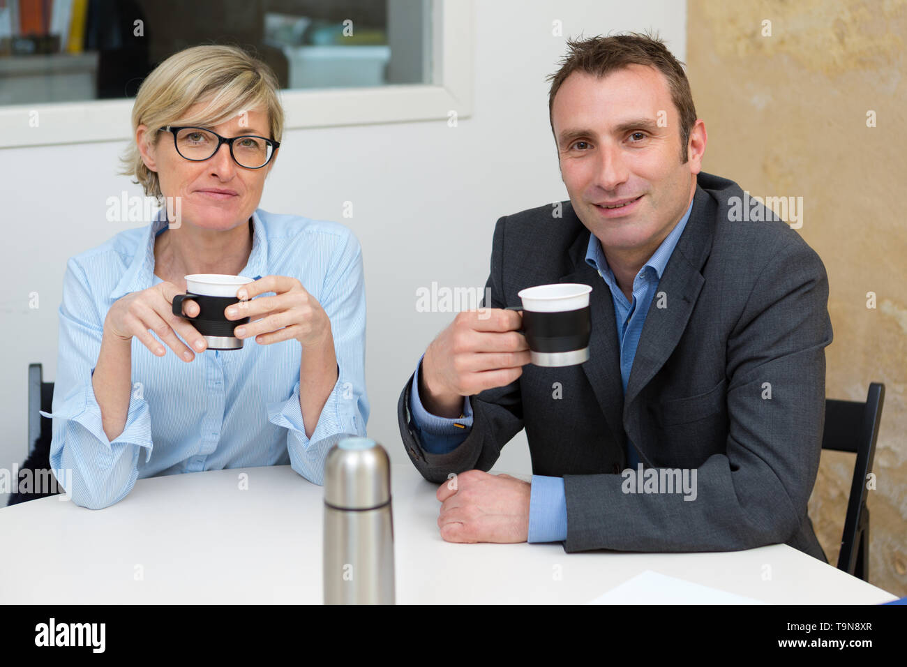 Two business executives talking hi-res stock photography and images - Alamy