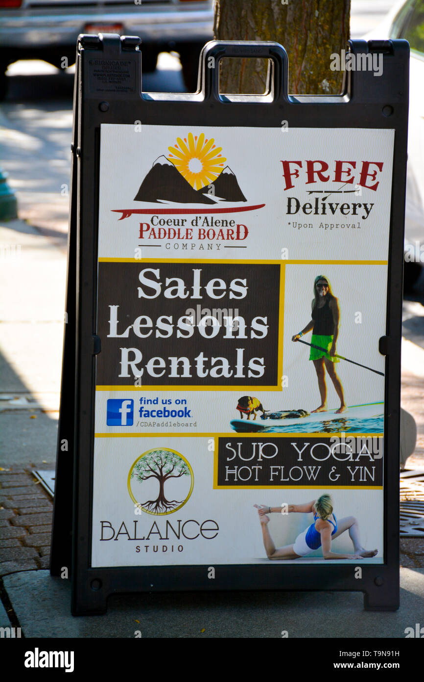 Sandwich board advertising on the sidewalk in downtown Coeur d'Alene ...