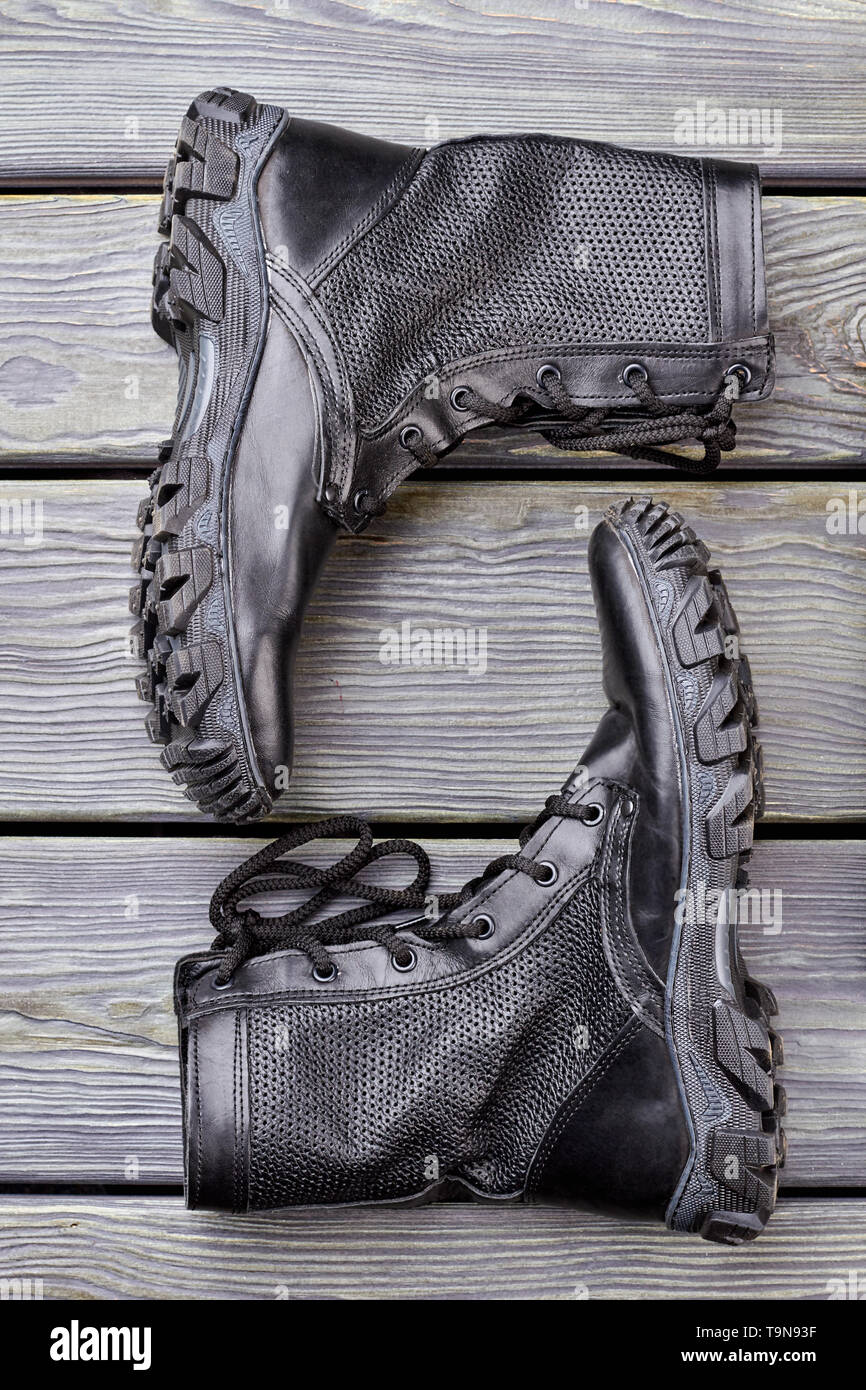 Pair of black combat boots, top view Stock Photo - Alamy