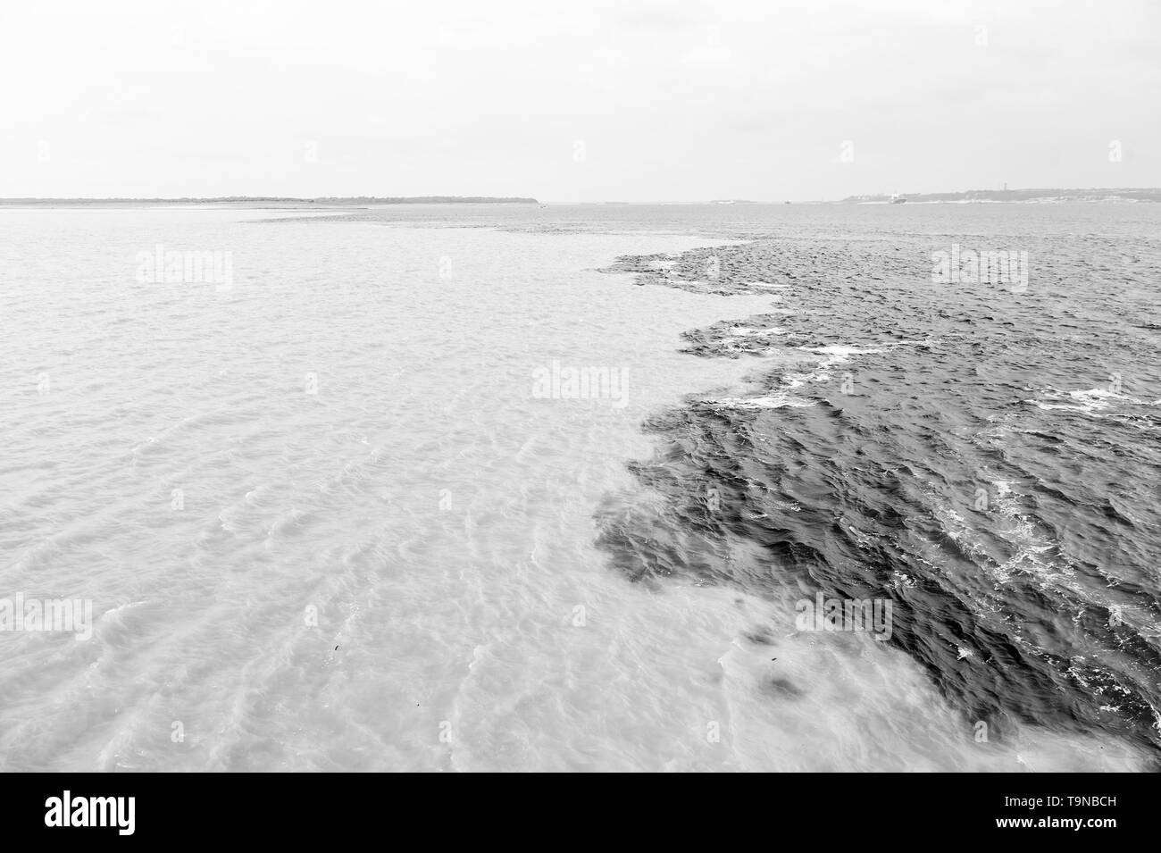 water meeting in brazil -amazon river with rio del negro clean and ...