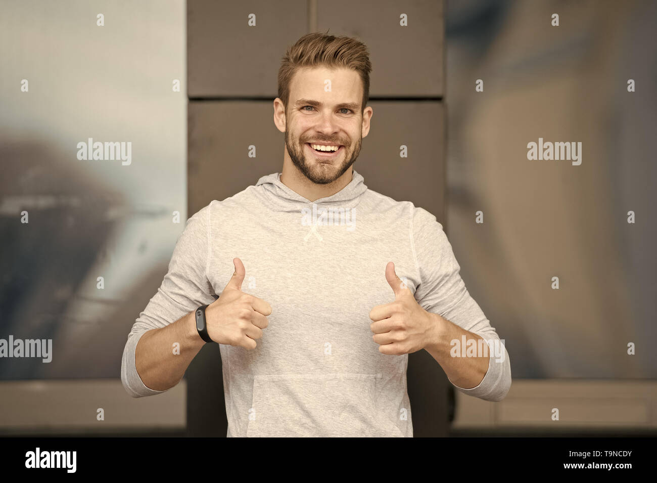 Approve or recommend concept. Man with brilliant smile unshaven face ...