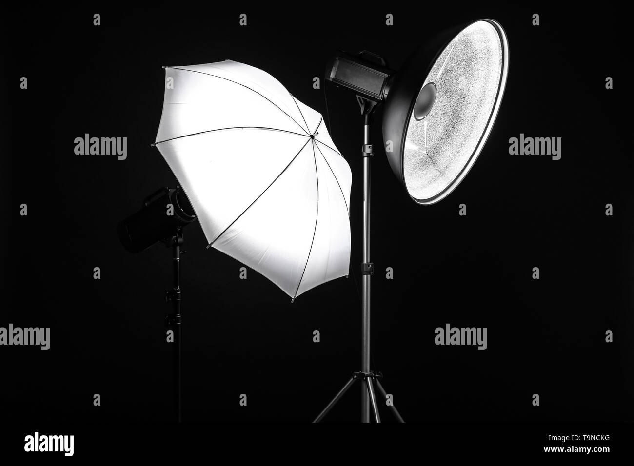 Professional lighting equipment on dark background Stock Photo - Alamy