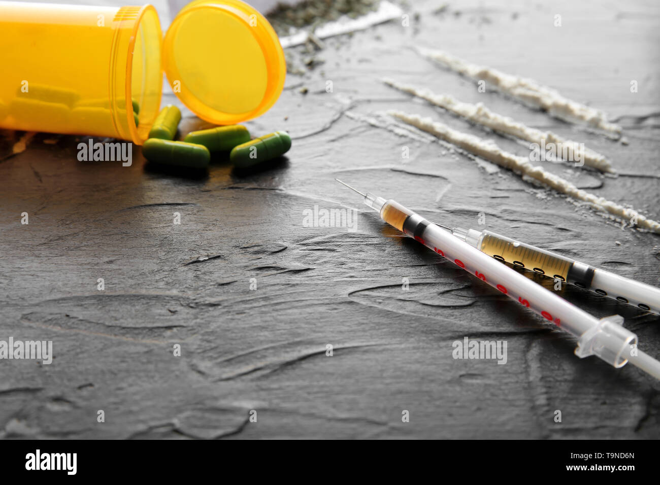 Drugs on textured background. Concept of addiction Stock Photo - Alamy