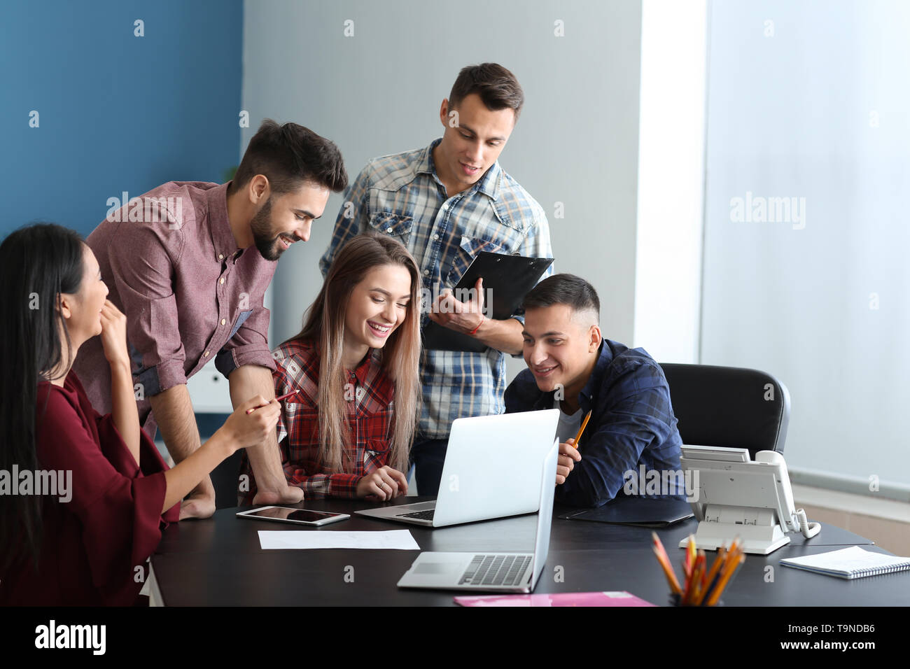 Group of young people studying at the university Stock Photo - Alamy