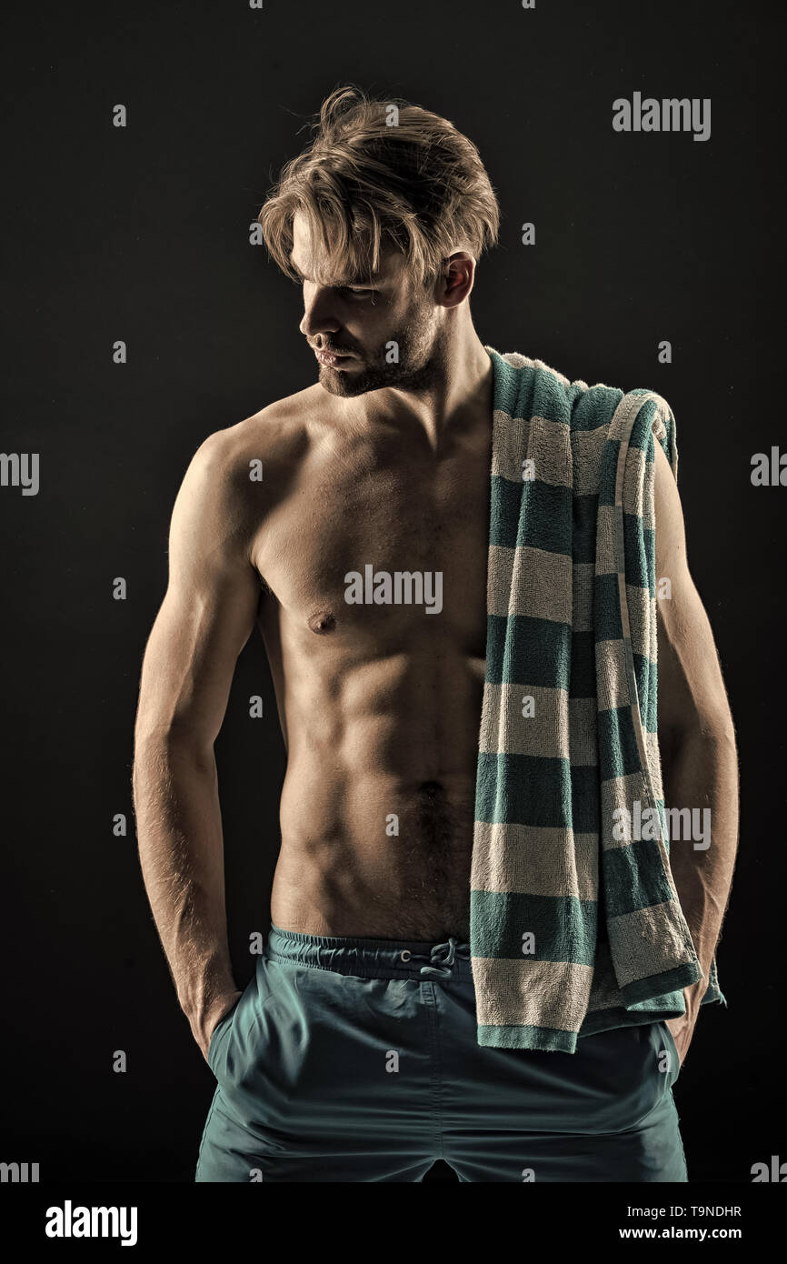 Spa man with towel, hygiene after training. Spa model with with fit ...