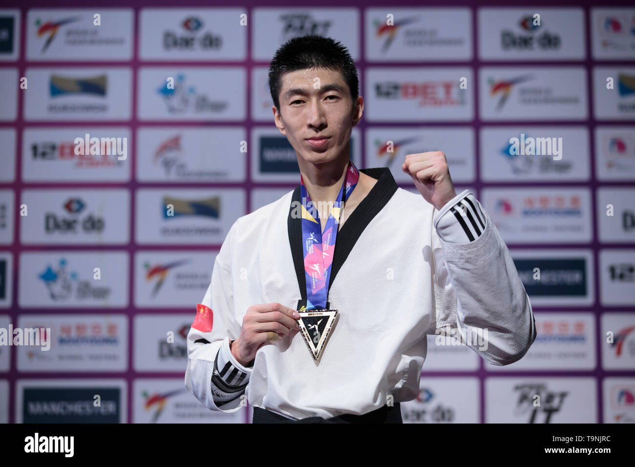 Manchester. 19th May, 2019. China's Zhao Shuai poses during the medal ...