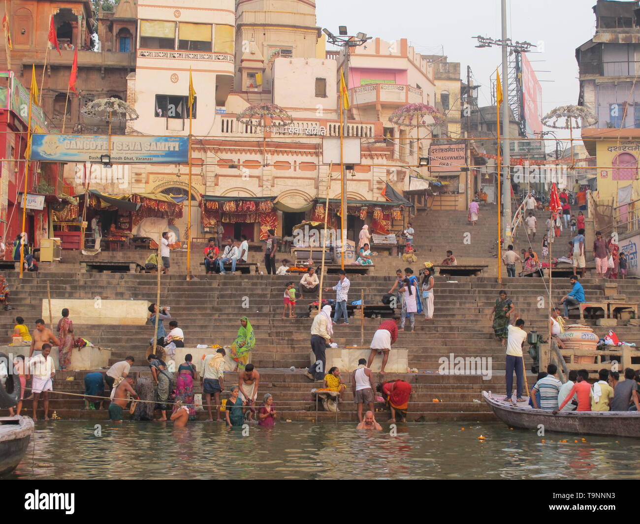 Varanasi, India. 26th Apr, 2019. Hindu pilgrims take a holy dip at ...