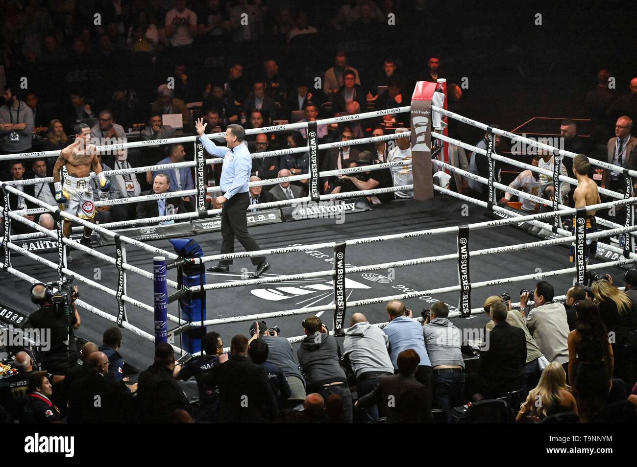 (L-R) Emmanuel Rodriguez (PUR), Michael Alexander (Referee), Naoya ...