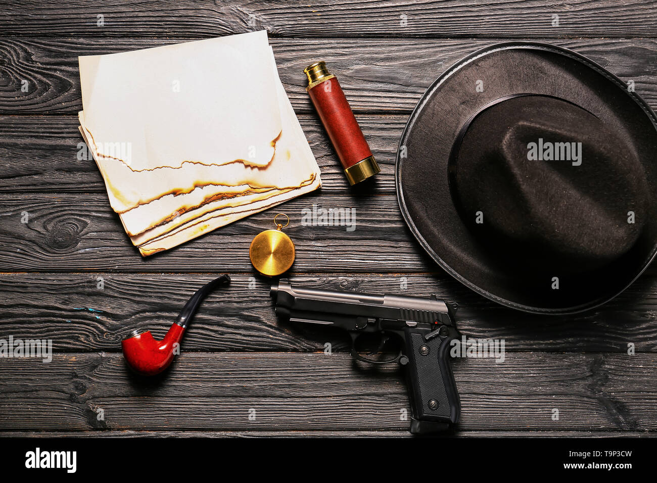 Composition with different items for detective on wooden background ...
