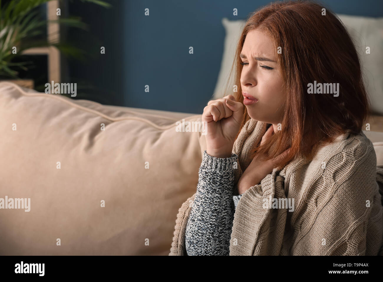 Young woman ill with flu at home Stock Photo - Alamy