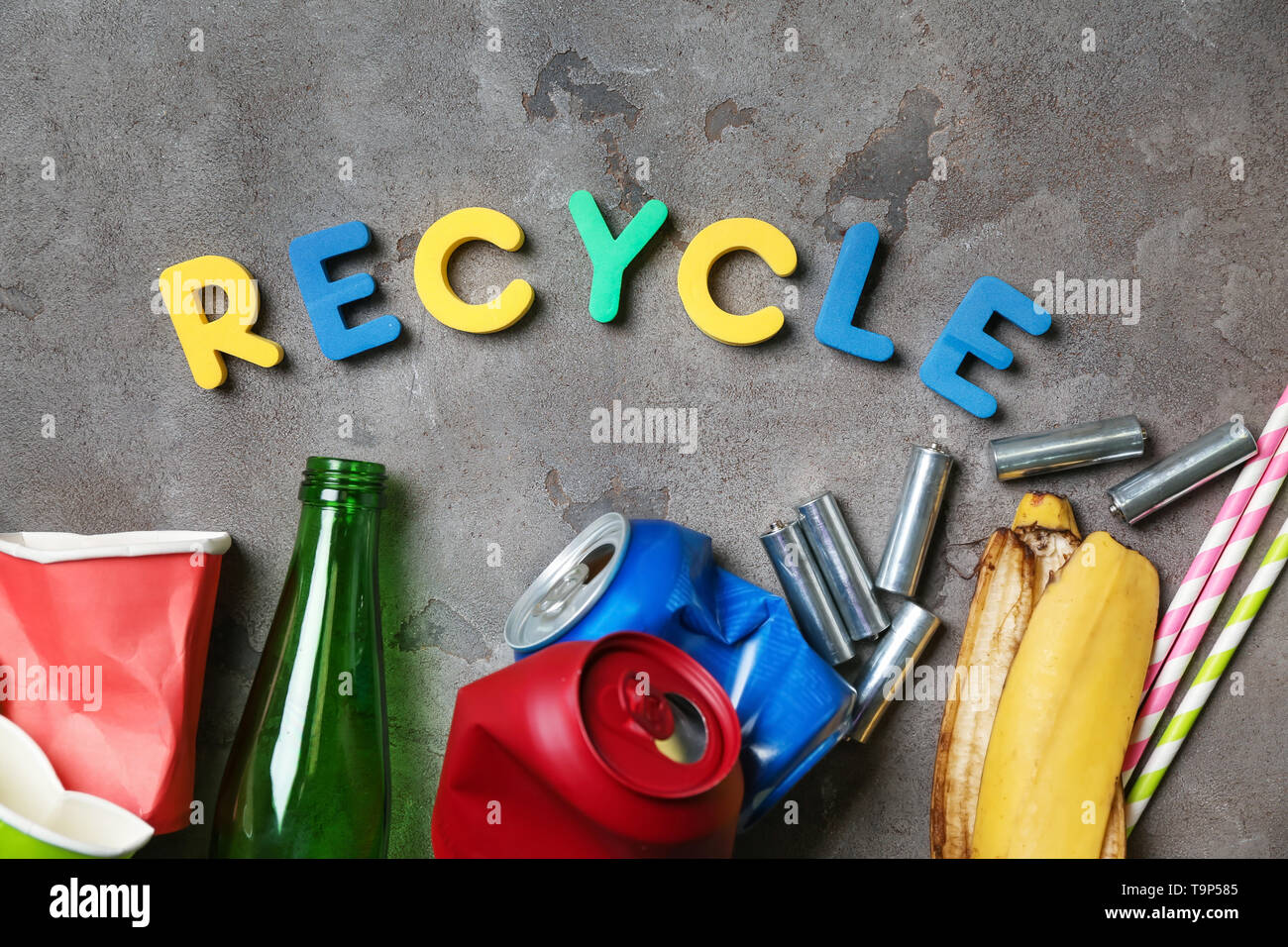 Word RECYCLE and different garbage on grey background Stock Photo - Alamy