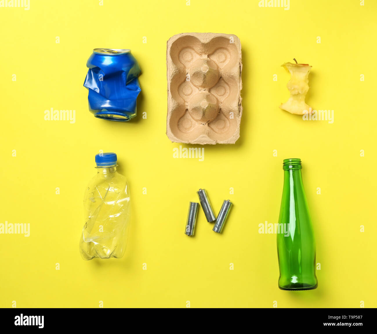 Different garbage on color background Stock Photo - Alamy