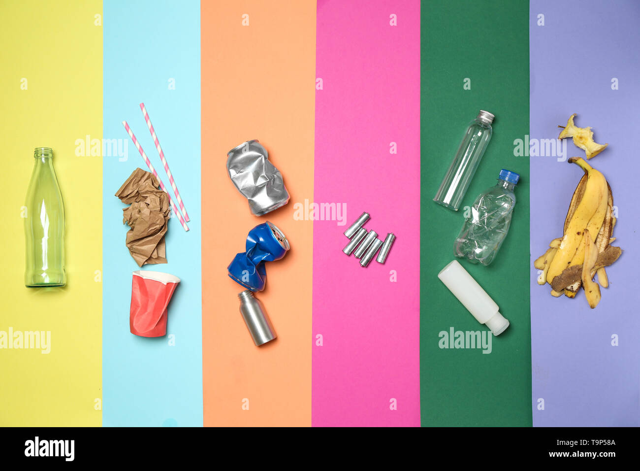 Different garbage on color background Stock Photo - Alamy