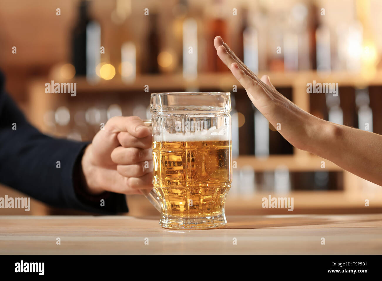 Woman rejecting man at bar hi-res stock photography and images - Alamy