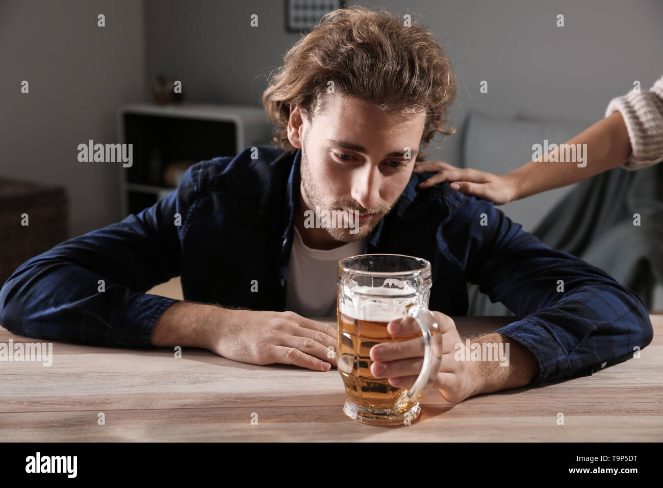 Woman's hand on shoulder hi-res stock photography and images - Alamy