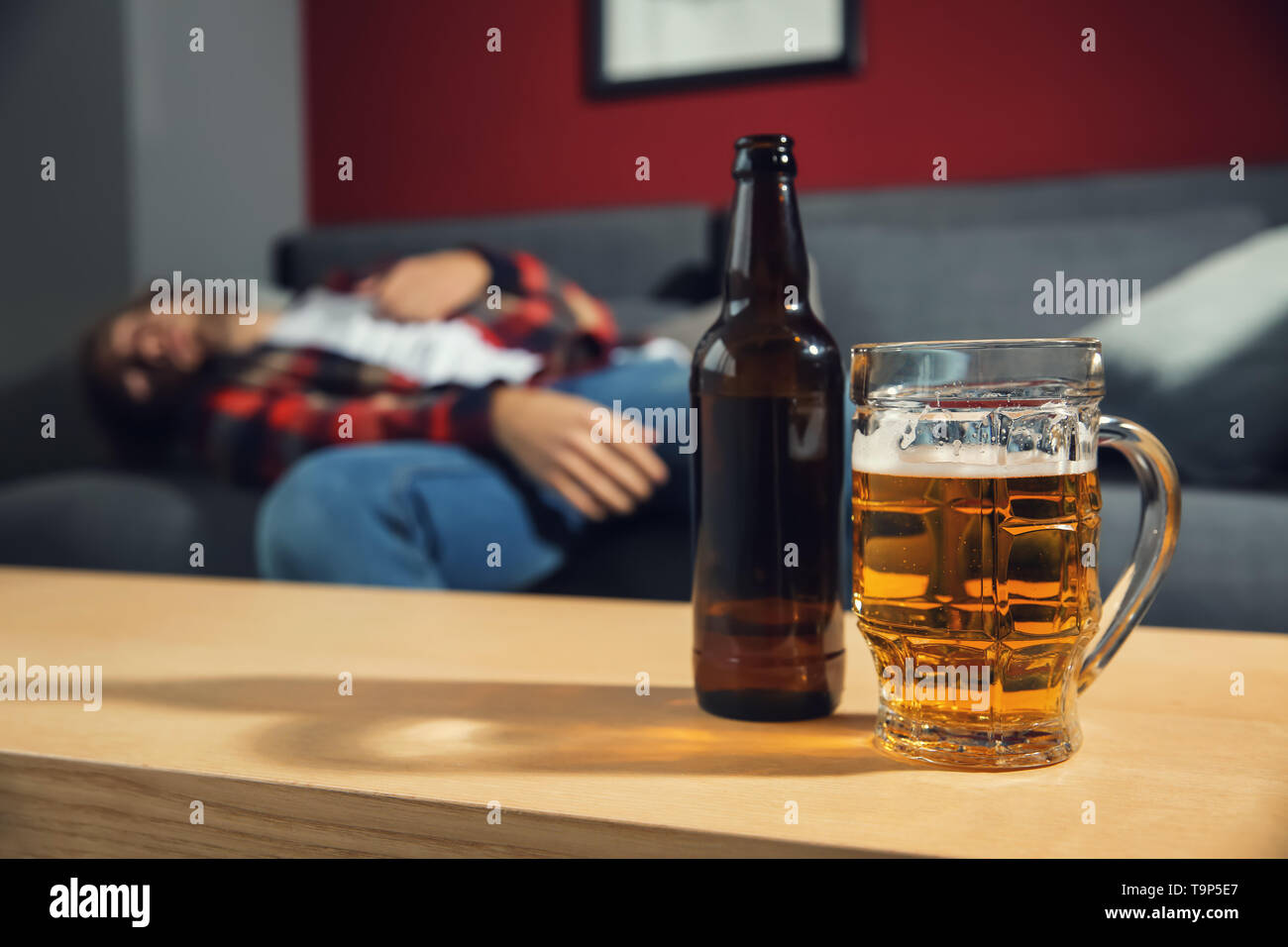 Man sleeping beer bottle hi-res stock photography and images - Alamy
