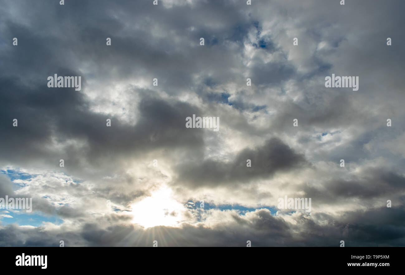 Beautiful sunset sky with lots of heavy clouds Stock Photo - Alamy