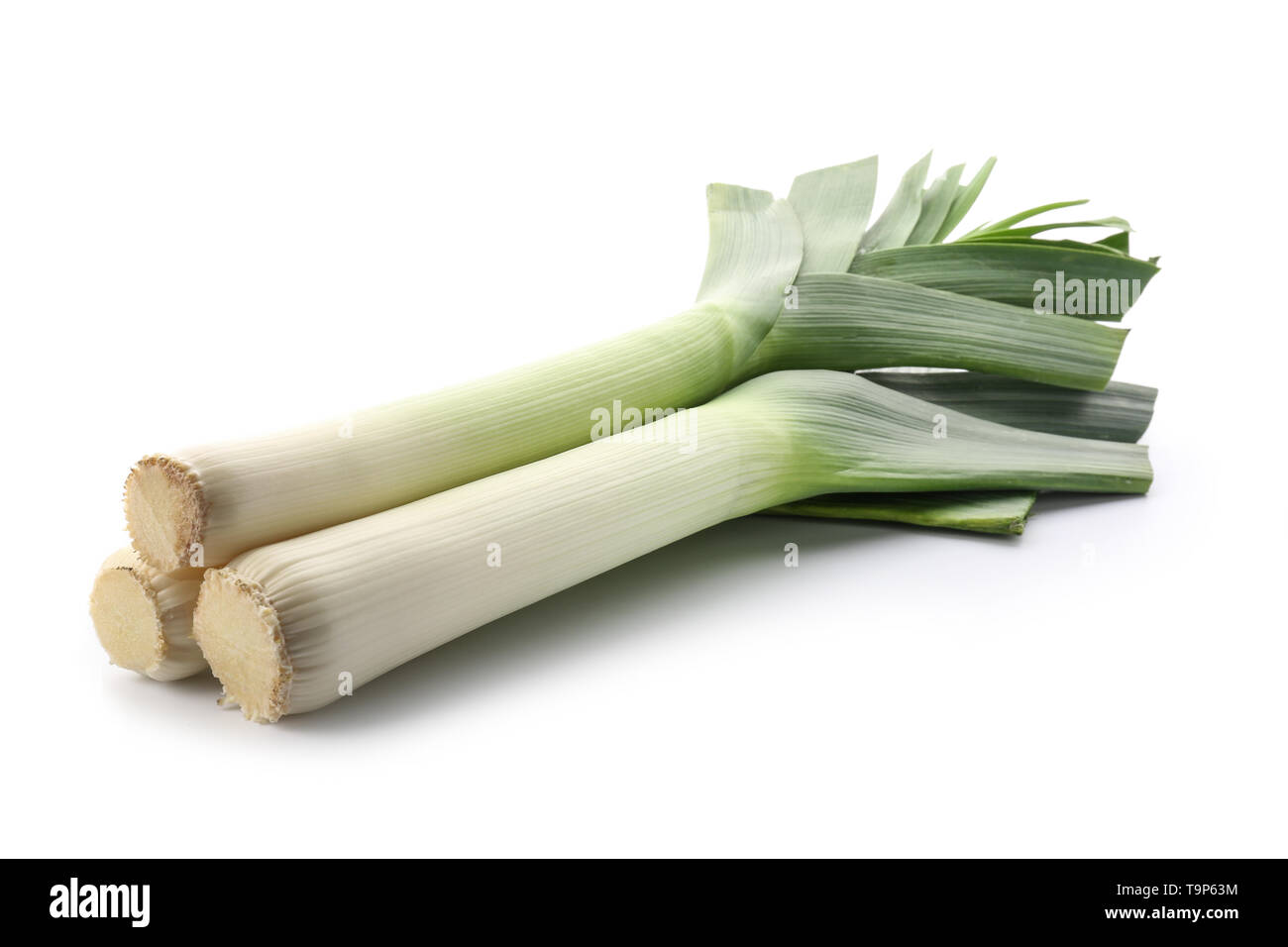Fresh green leeks on white background Stock Photo - Alamy Fresh green leeks on white background Stock Photo - Alamy