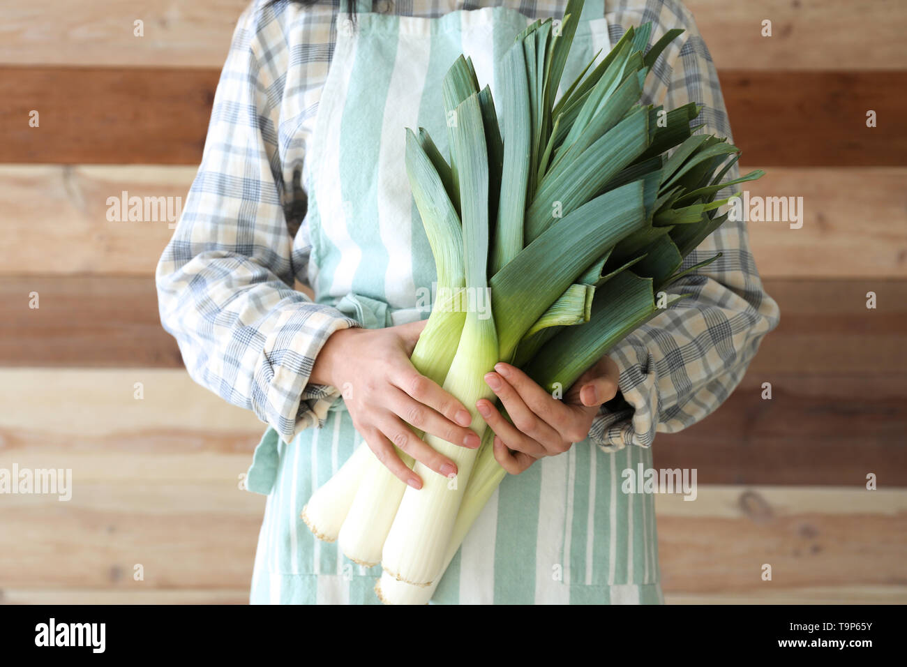 Holding leeks hi-res stock photography and images - Alamy