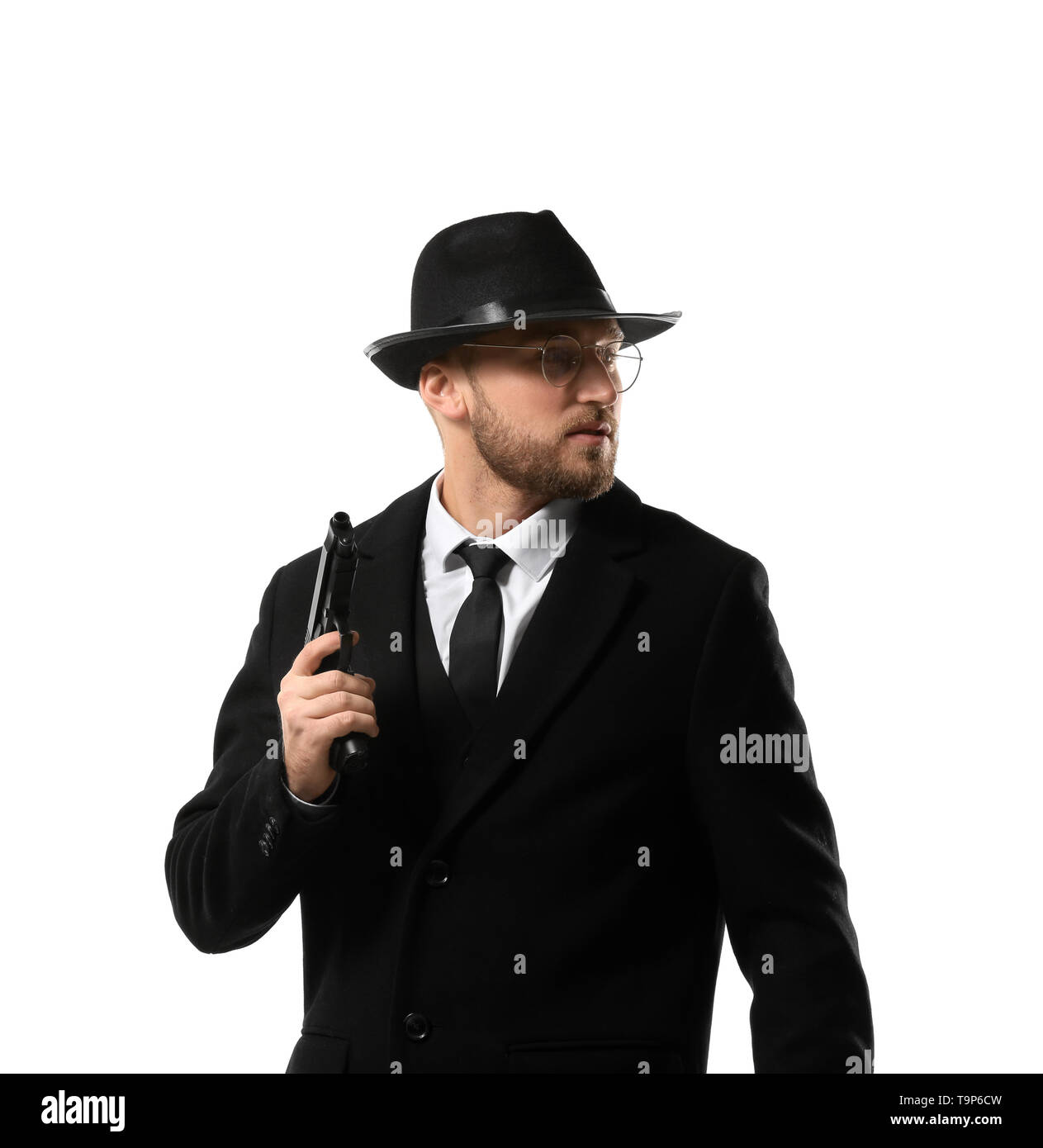 Detective with gun on white background Stock Photo - Alamy