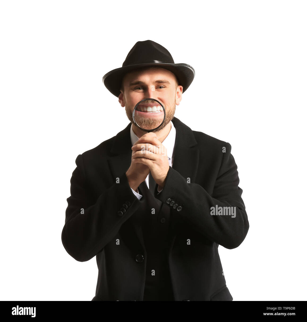 Detective with magnifying glass on white background Stock Photo - Alamy