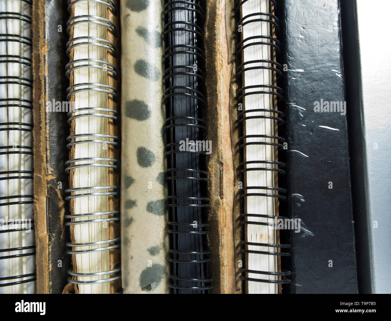 Notebook on shelf Stock Photo - Alamy