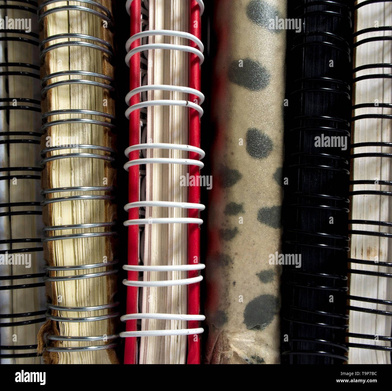 Notebook on shelf Stock Photo - Alamy