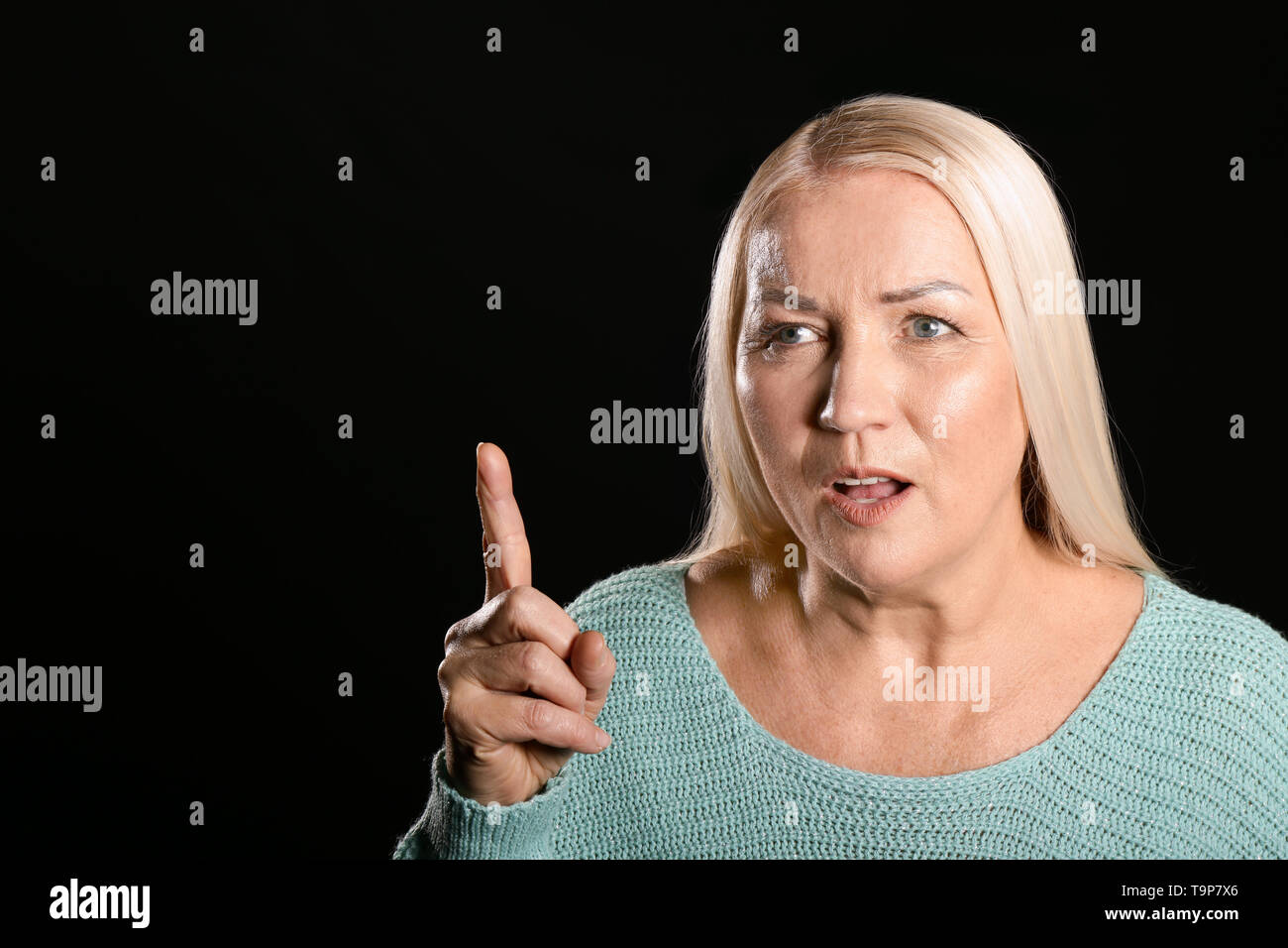 Middle finger blonde hi-res stock photography and images - Alamy