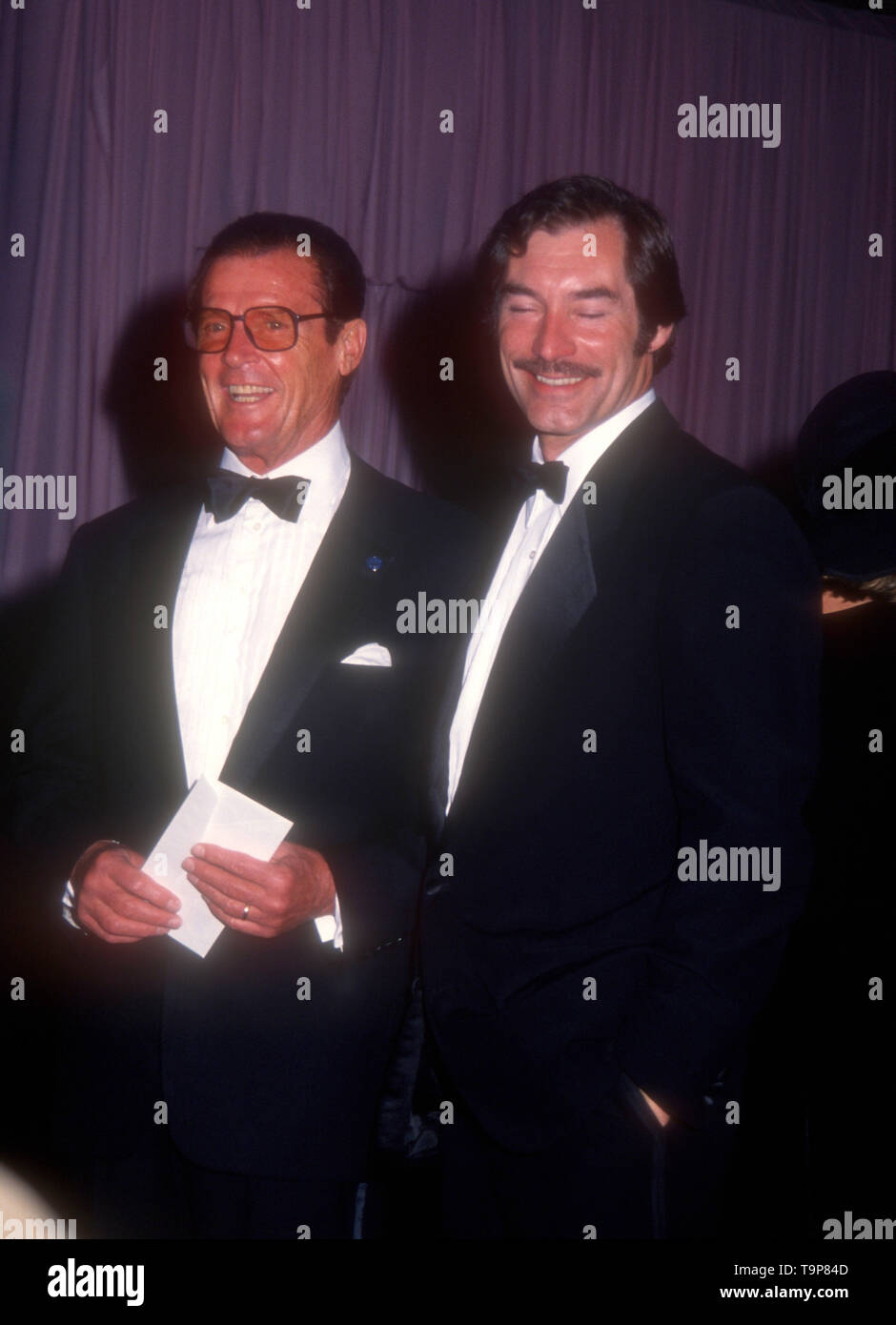 Westwood, California, USA 19th April 1994 Actor Roger Moore and actor ...