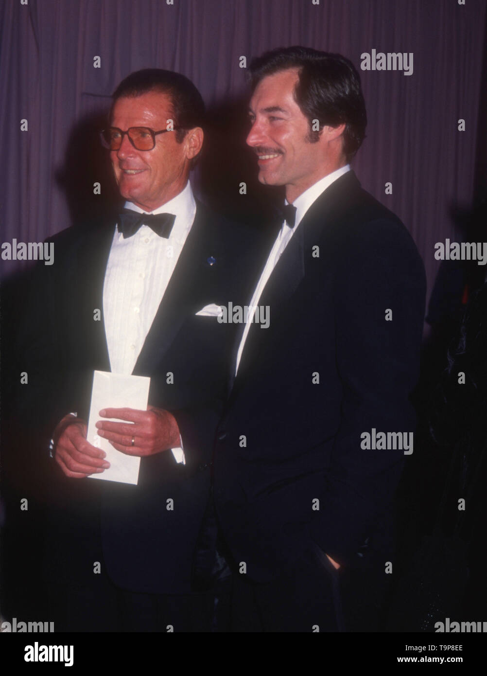 Westwood, California, USA 19th April 1994 Actor Roger Moore and actor ...