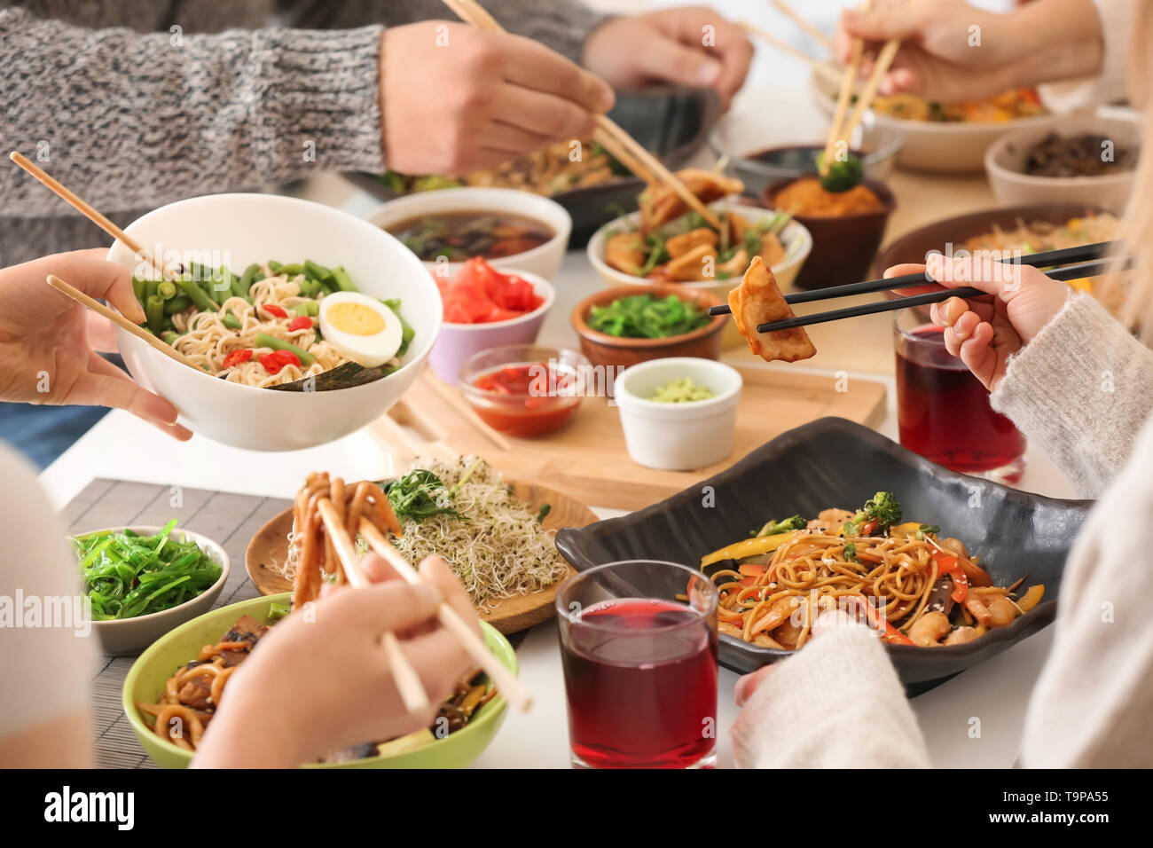 Asian person eating dumpling hi-res stock photography and images - Alamy