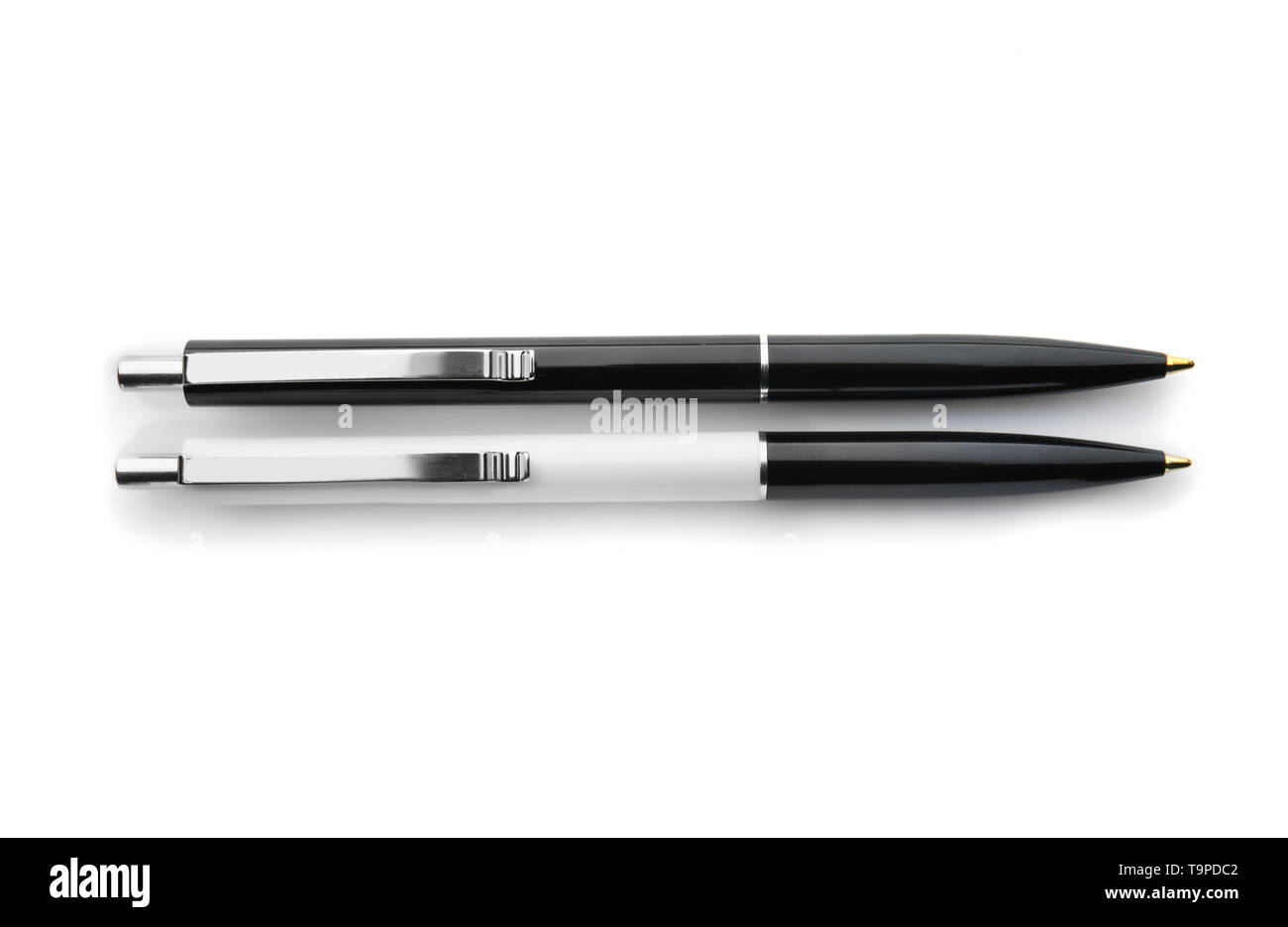 Stylish pens on white background Stock Photo - Alamy