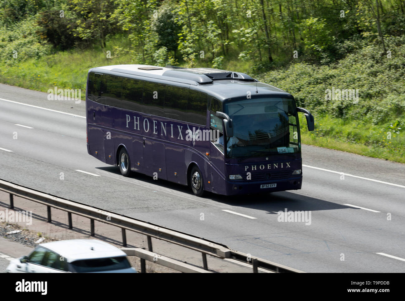 A Phoenix coach on the M40 motorway, Warwickshire, UK Stock Photo - Alamy