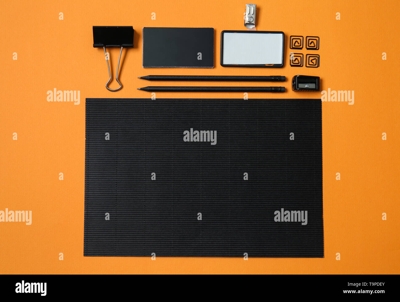 Set of items for branding on color background Stock Photo - Alamy