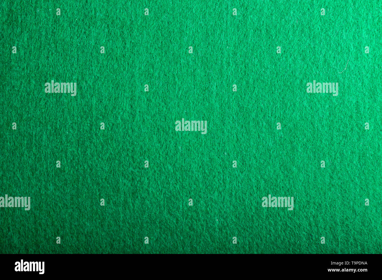 Green poker table, closeup Stock Photo - Alamy