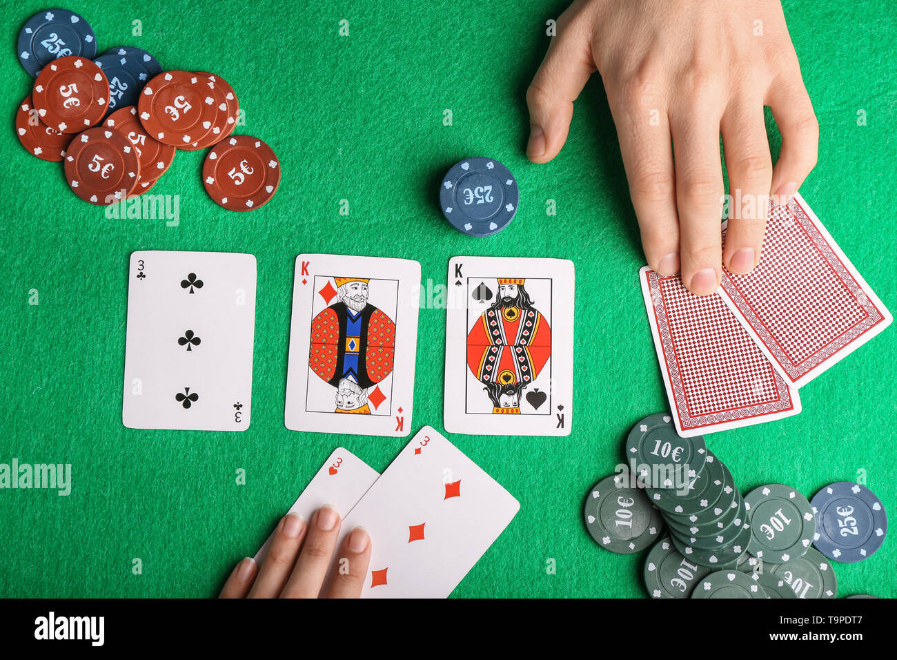 People playing poker table hi-res stock photography and images - Alamy