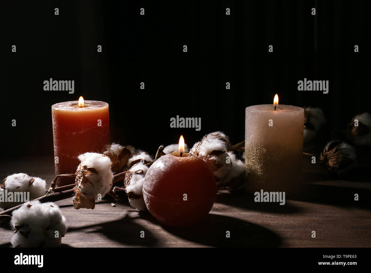 Beautiful burning candles cotton hi-res stock photography and images ...